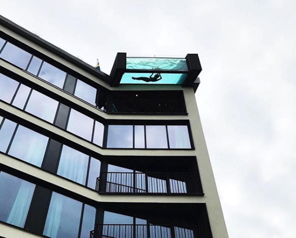 Glass Hotel Pools With Crazy City Views